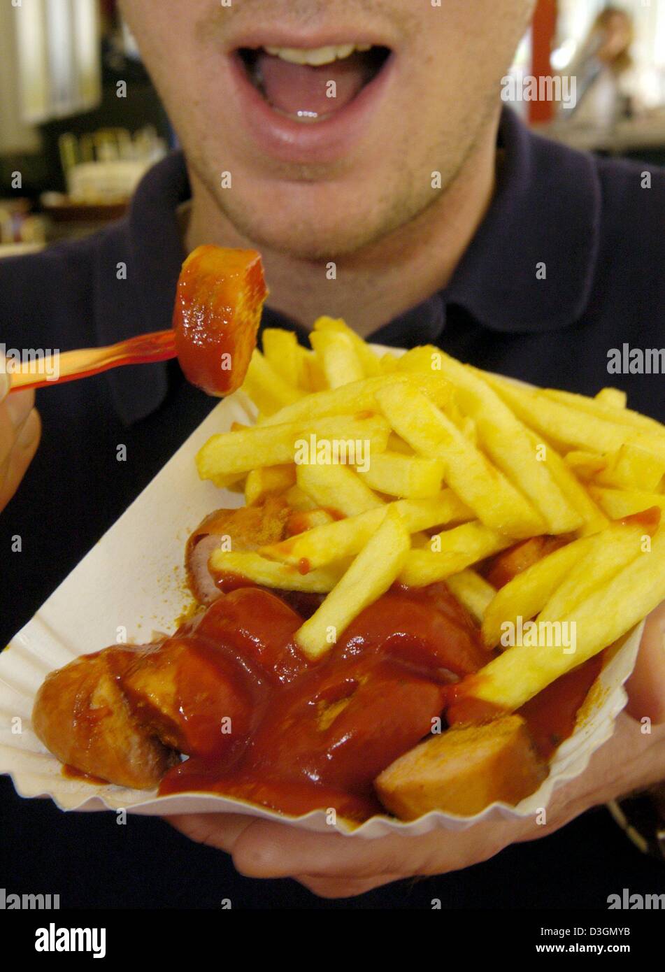 Human interest hum gastronomy sausage fries currywurst eating food ...