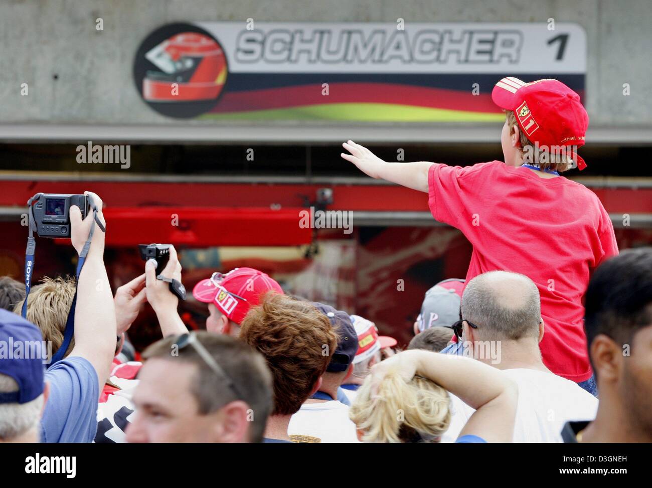 Ferrari fans in stands hi-res stock photography and images - Alamy