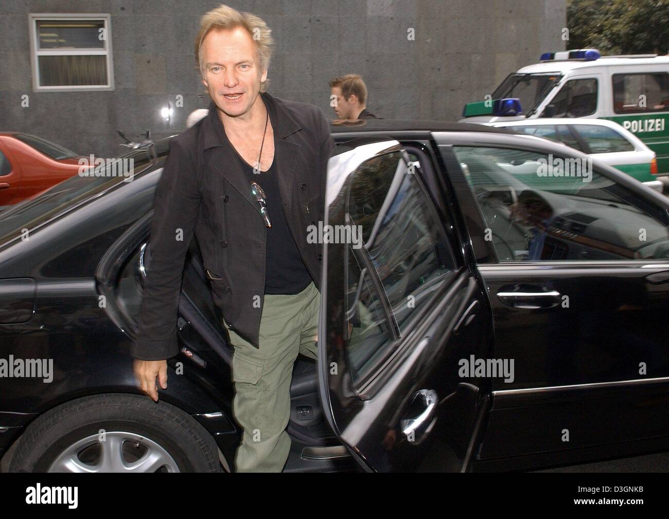 (dpa) - British pop singer Sting steps out of a car as arrives for an ...