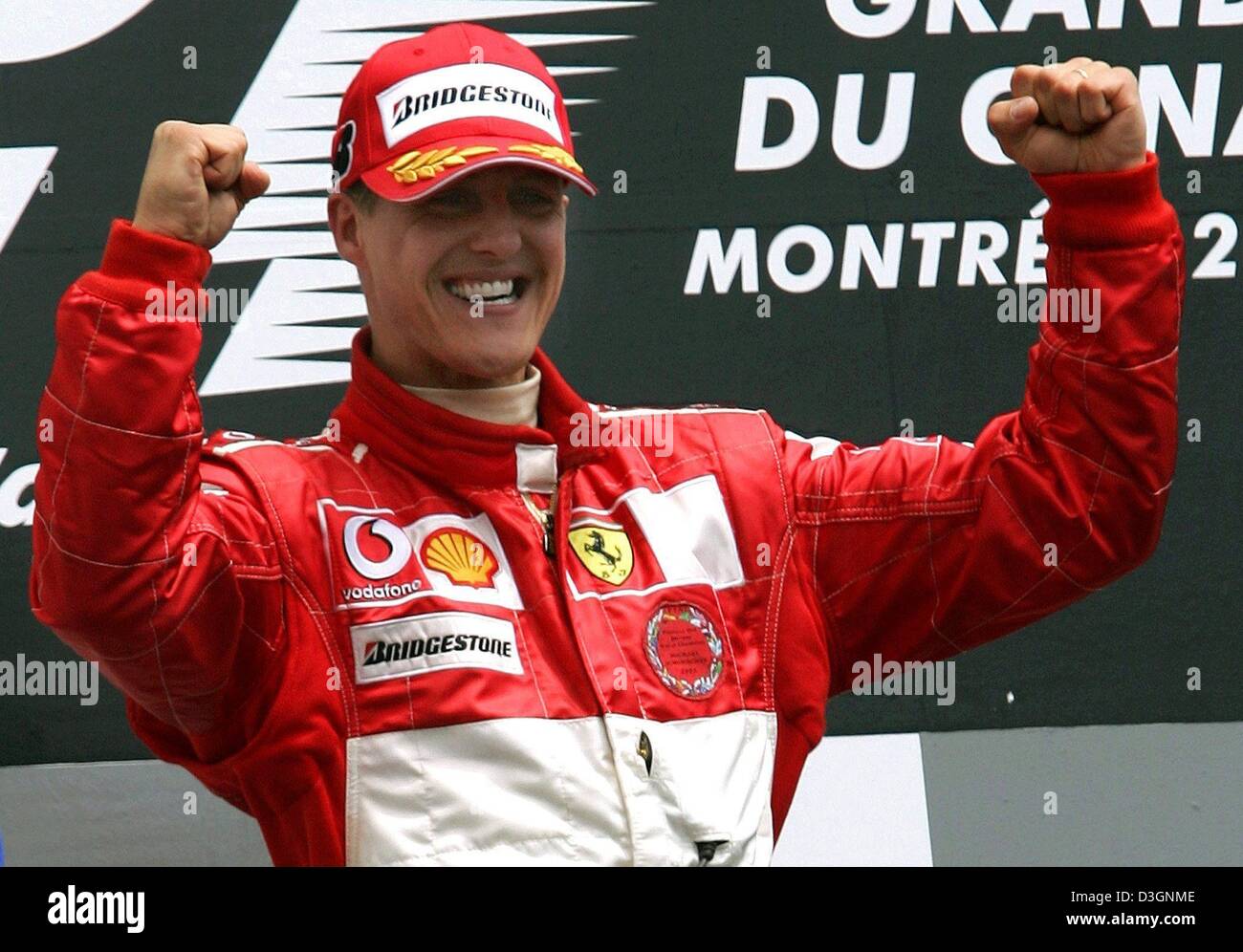 (dpa) - German formula one champion Michael Schumacher cheers after ...