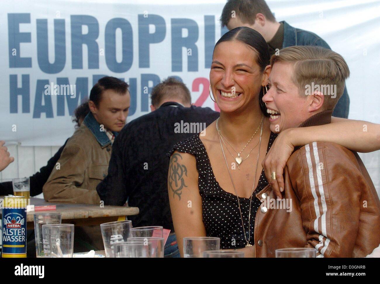 (dpa) - Julia and Maja laugh and cheer as they attend the 'Europride ...
