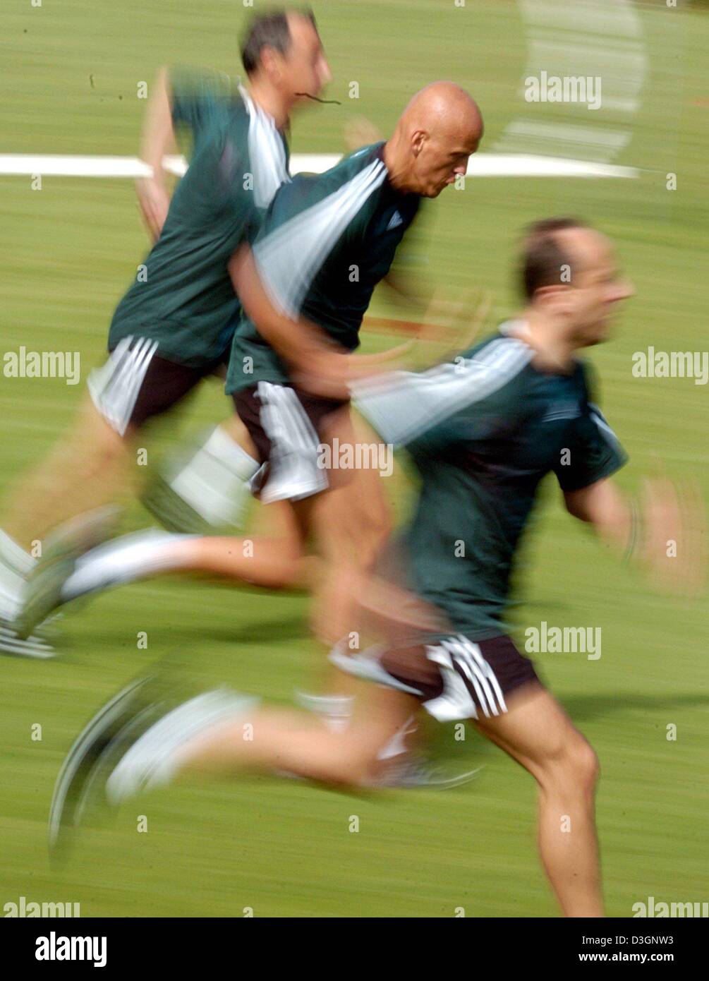 (dpa) - Italian UEFA referee Pierluigi Collina (front) and his ...