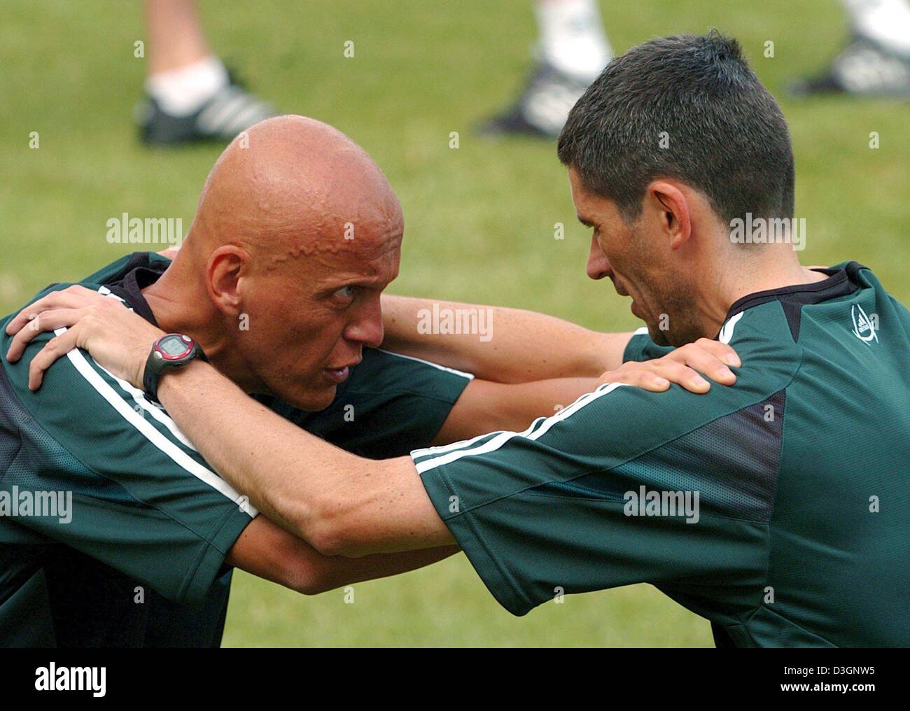 (dpa) - Italian UEFA referee Pierluigi Collina (L) and his German ...