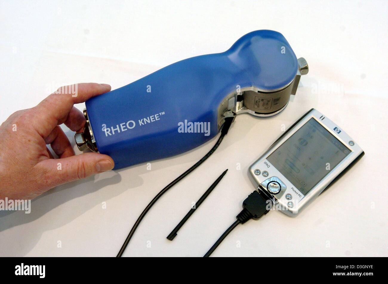 (dpa) - A hand reaches for the 'intelligent' knee joint Rheo Knee which ...