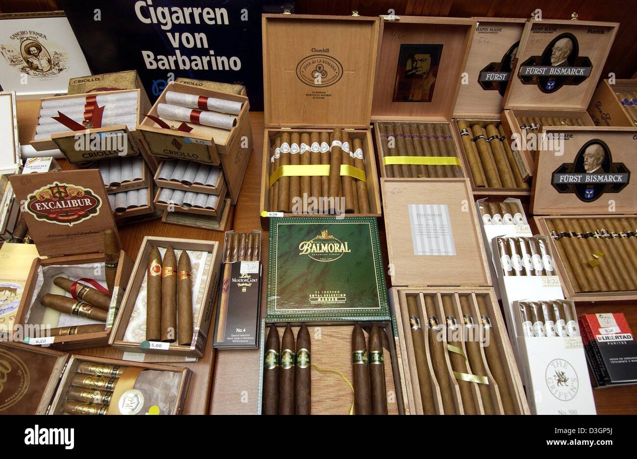 (dpa) - Various cigars from around the world lie in their cases on ...