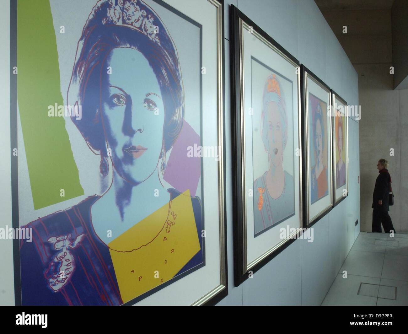 (dpa) - Pictures with the portrait of Queen Beatrix of the Netherlands ...