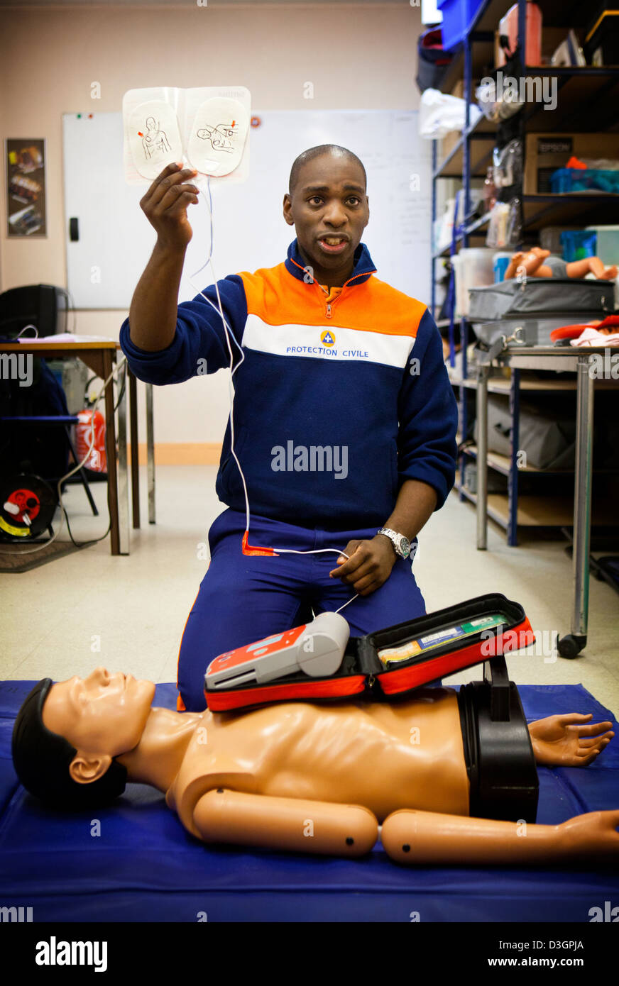 Automated external defibrillator person hi-res stock photography and ...