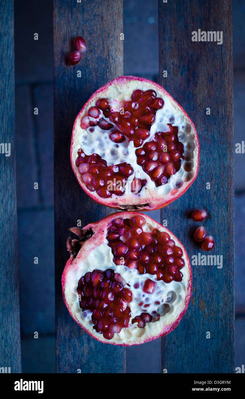 Two halves pomegranate hi-res stock photography and images - Alamy