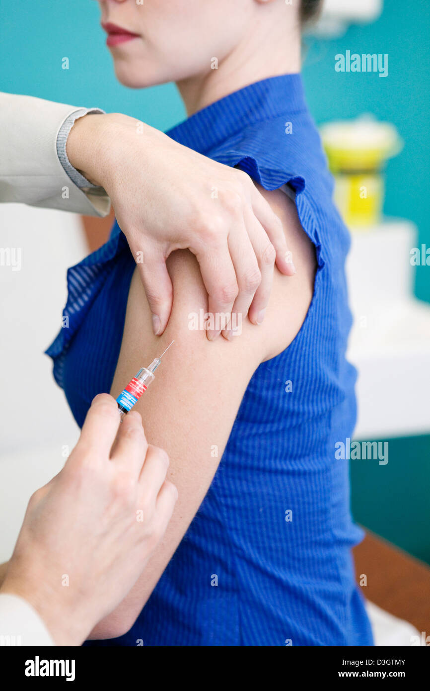 Woman injection arm hi-res stock photography and images - Alamy