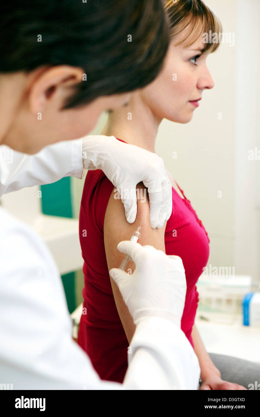 Woman injection arm hi-res stock photography and images - Alamy