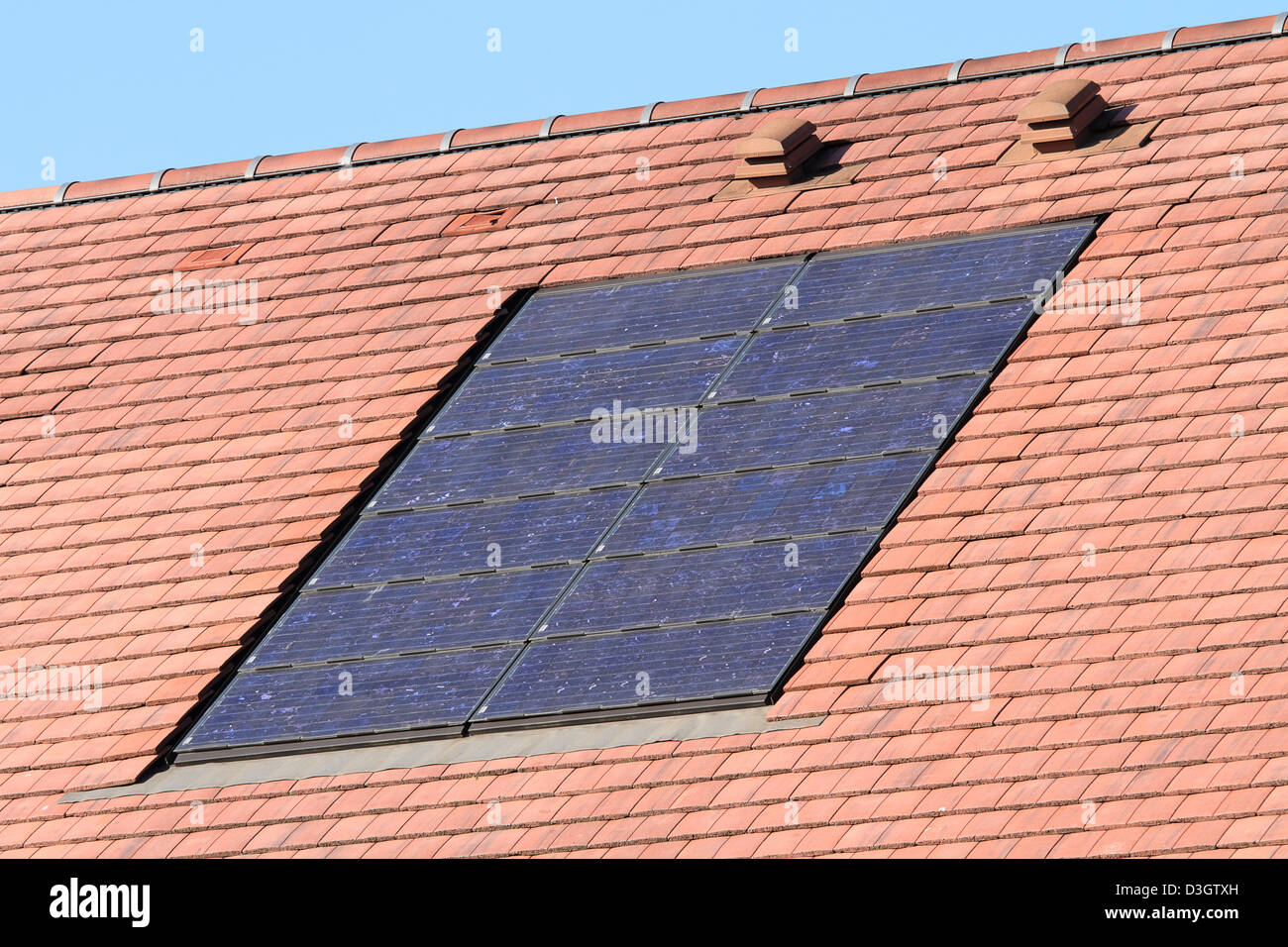 Solar photovoltaic panel array on house roof Stock Photo - Alamy