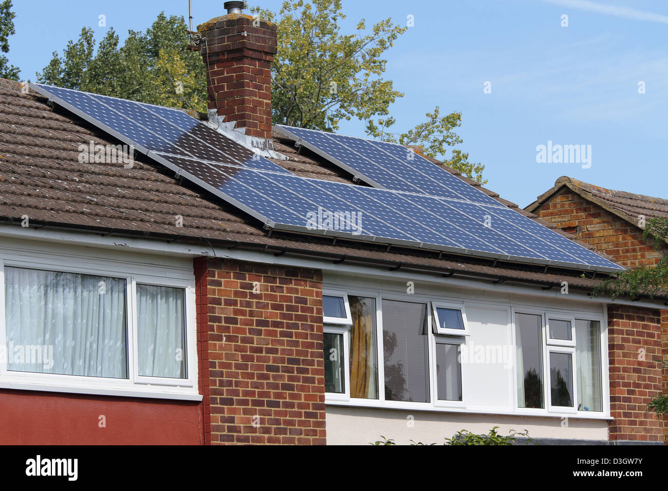 Solar photovoltaic panel array on house roof Stock Photo - Alamy