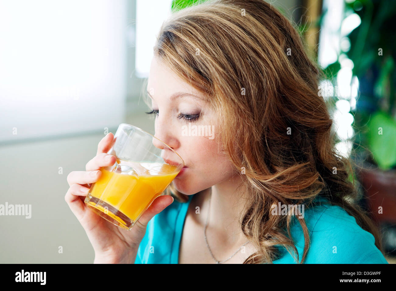WOMAN WITH COLD DRINK Stock Photo - Alamy