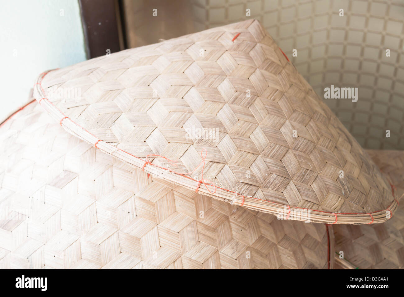 Asian woven hat made from tropical leaves Stock Photo - Alamy