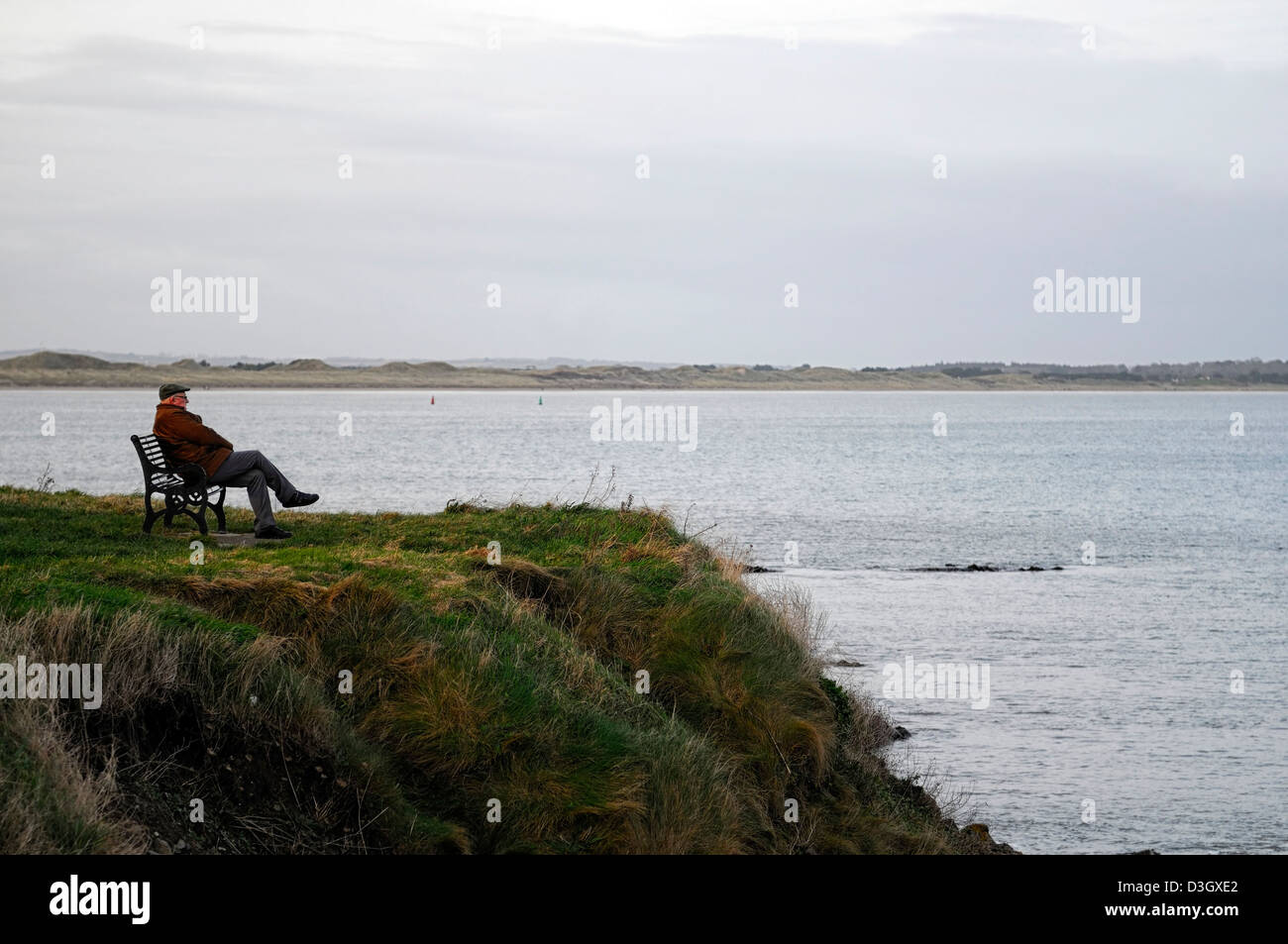 old elderly man lone single alone on own sit sitting bench look looking ...