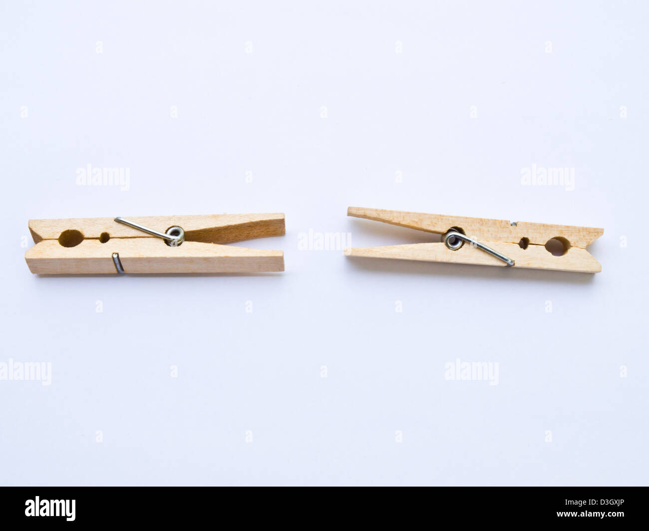 Wooden clothes clips isolated on white background Stock Photo - Alamy