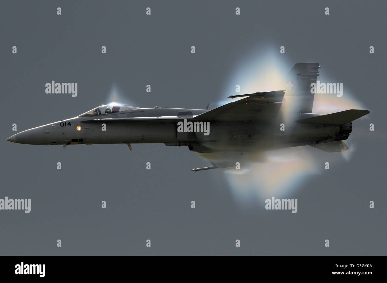 A shock wave created around a Swiss Air Force Hornet jet fighter during ...
