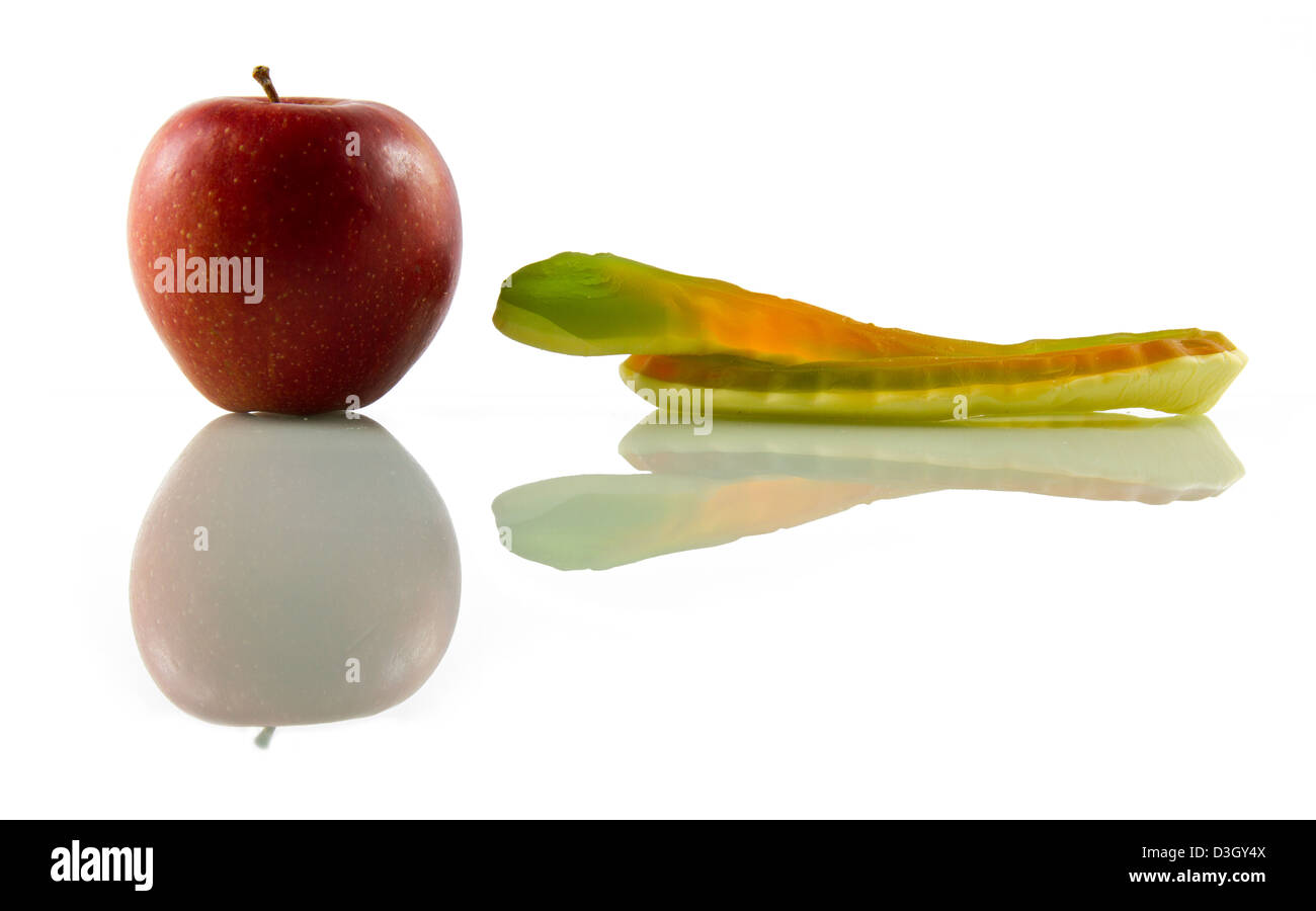 Apple and snake, reflected Stock Photo - Alamy
