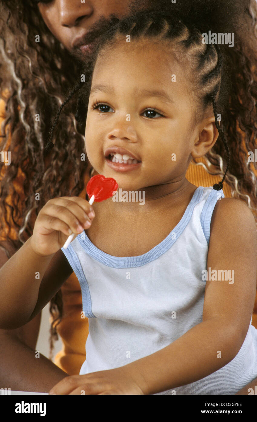 Women with child snacking hi-res stock photography and images - Alamy