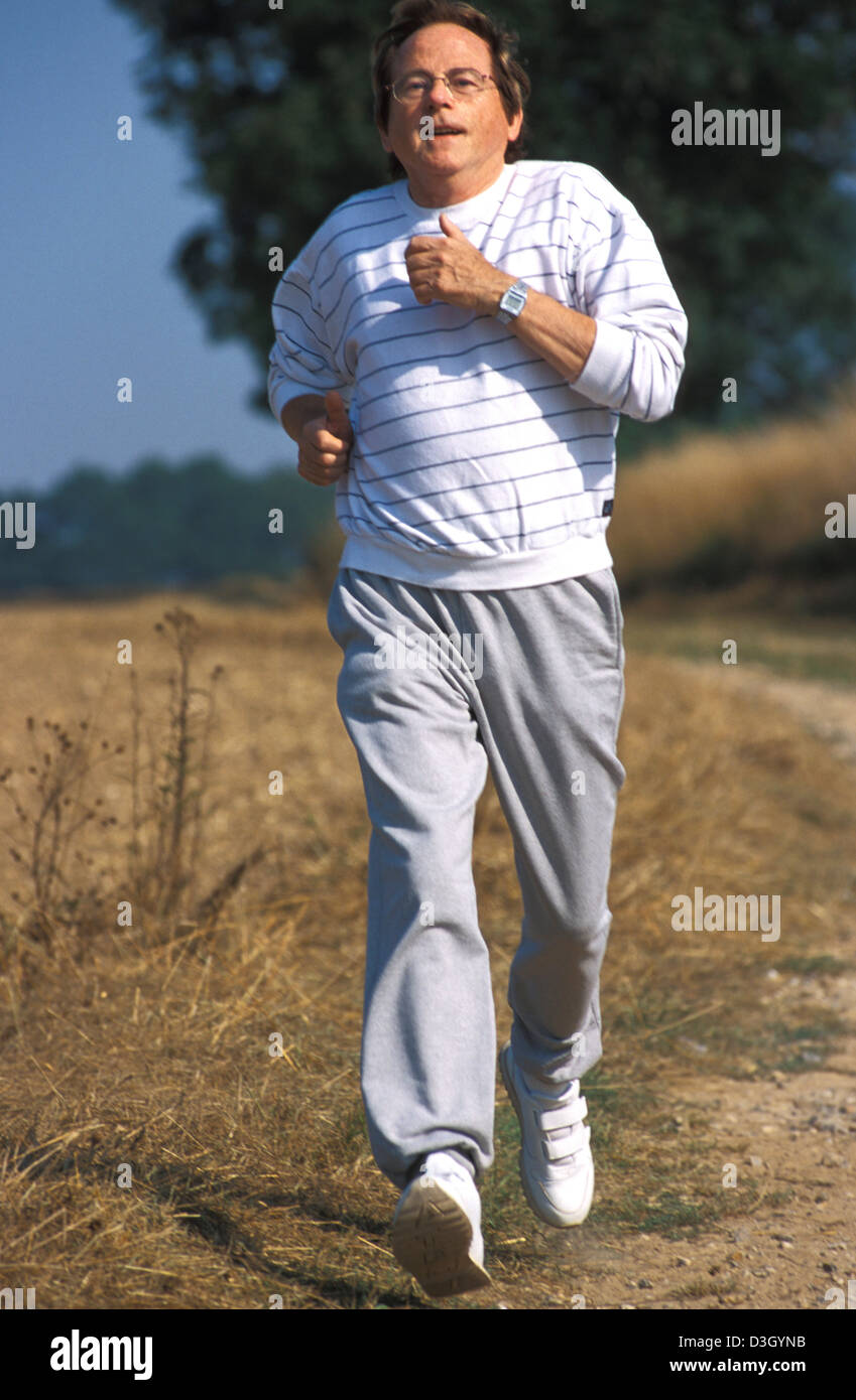 60 year old man exercise jogging hi-res stock photography and images ...