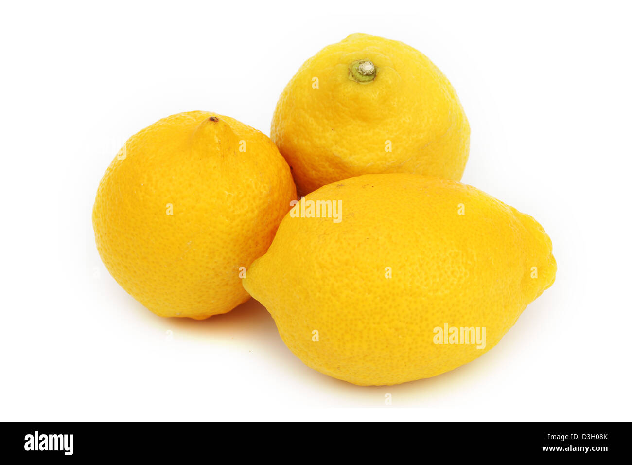 yellow lemons pile isolated on white Stock Photo - Alamy