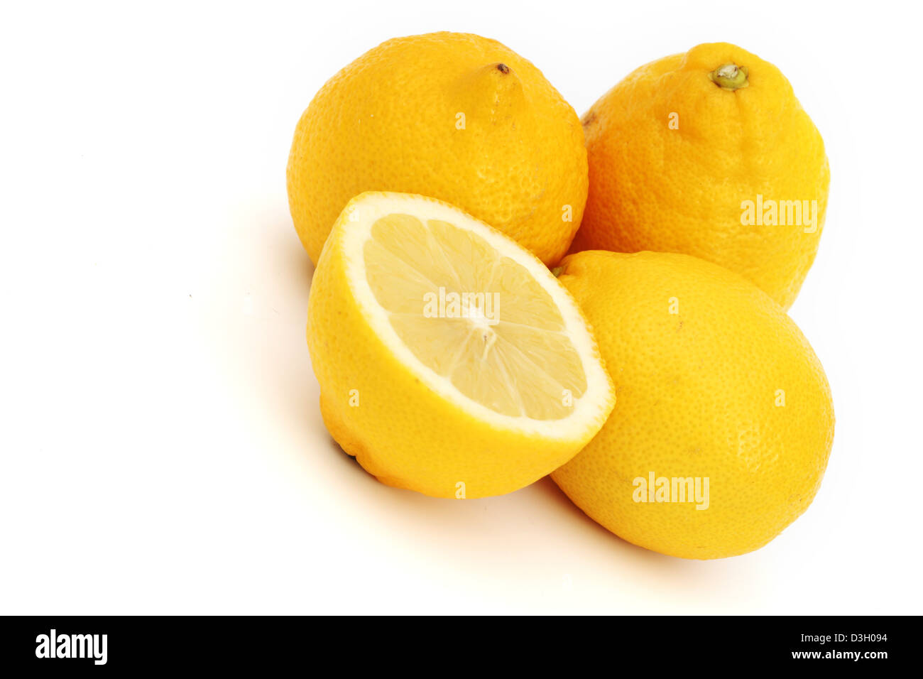 yellow lemons slice pile isolated on white Stock Photo - Alamy