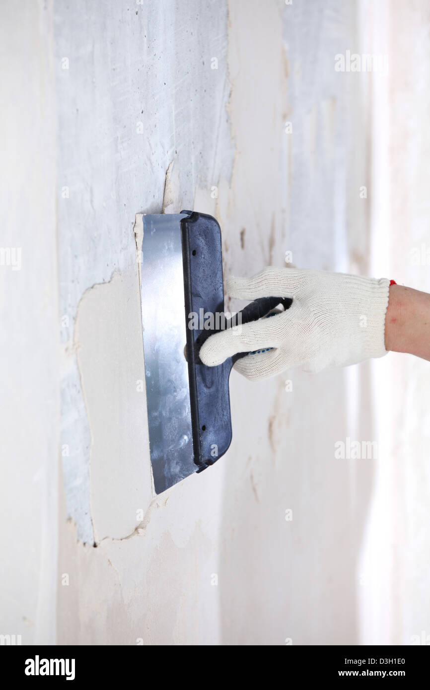 work aligns with a spatula wall Stock Photo - Alamy