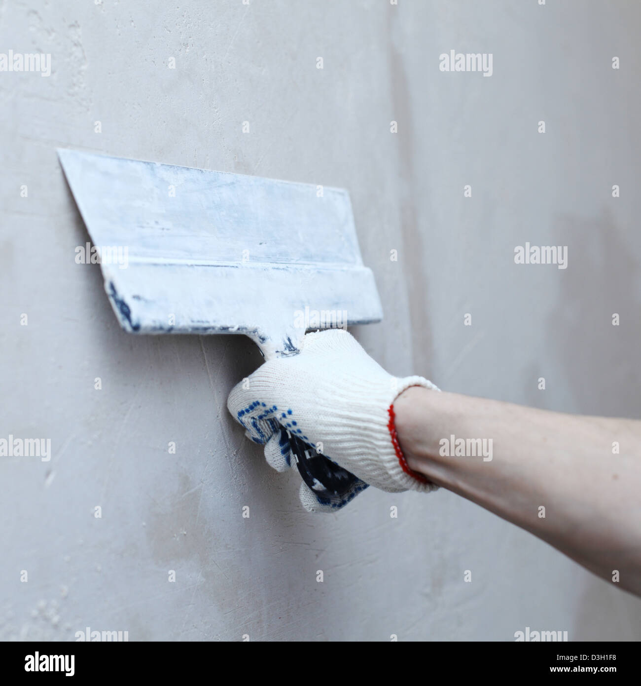work aligns with a spatula wall Stock Photo - Alamy