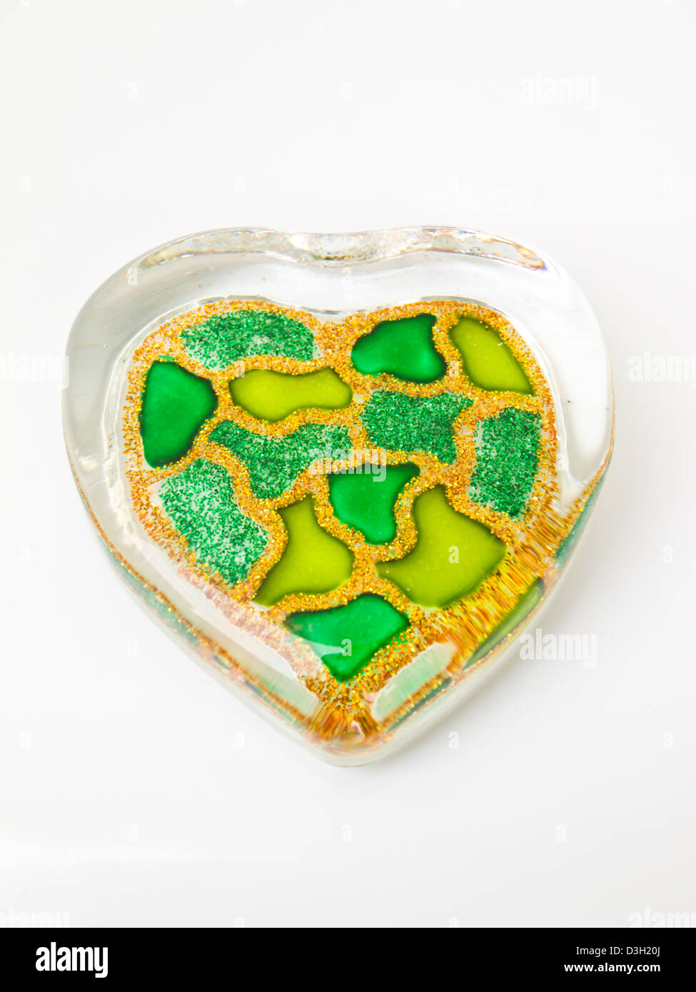 A green stain glass heart isolated on white background Stock Photo - Alamy