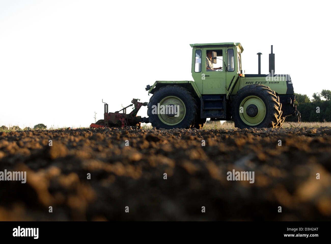 Hamm, Germany, Tractor in tillage Stock Photo - Alamy
