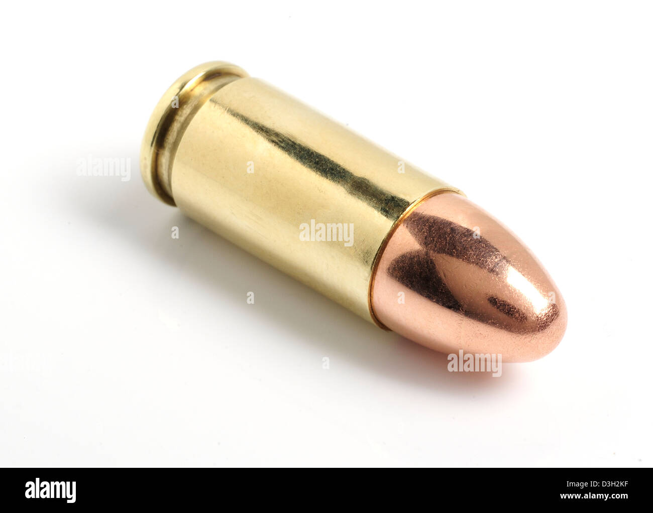 9mm Winchester Luger bullet against white backdrop Stock Photo - Alamy