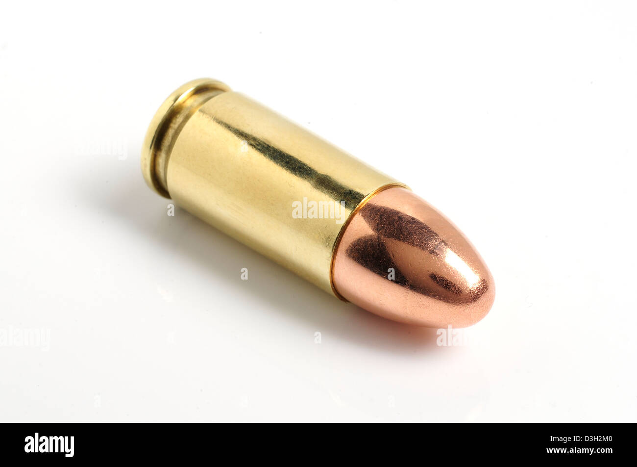 9mm Winchester Luger bullet against white backdrop Stock Photo - Alamy