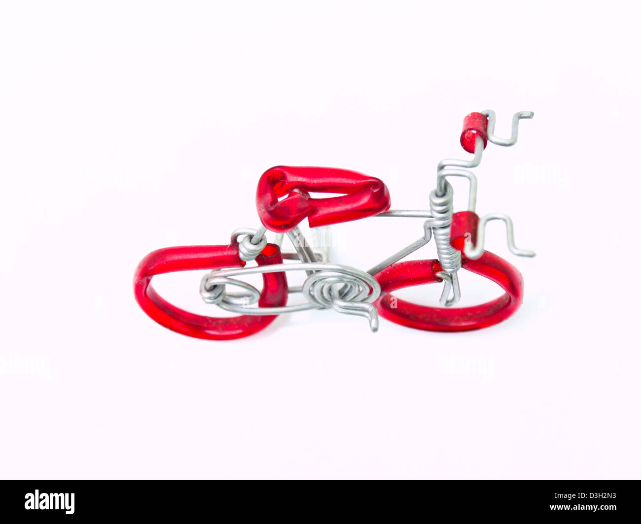 A red miniature bike model, handicraft model from Thailand, isolated on ...