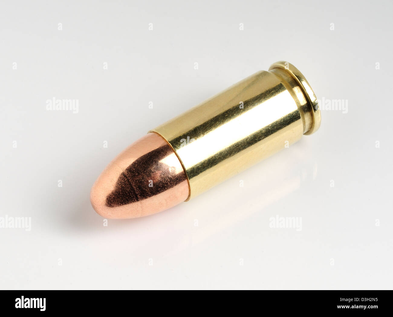9mm Winchester Luger bullet against white backdrop Stock Photo - Alamy