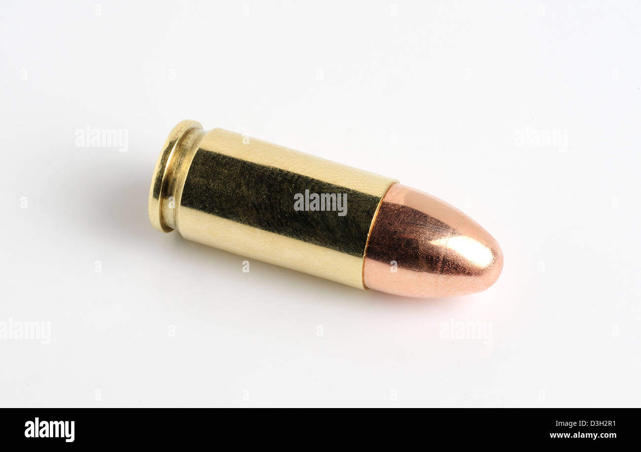 9mm Winchester Luger bullet against white backdrop Stock Photo - Alamy