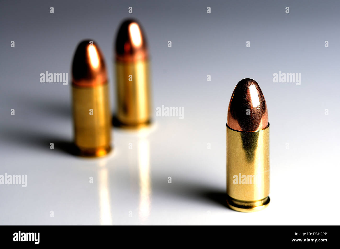9mm Winchester Luger bullets against white backdrop Stock Photo - Alamy