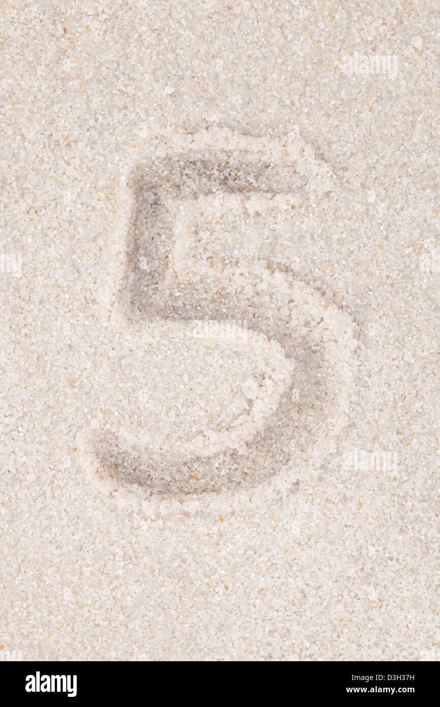 Digits on sand - clean background - 5 - Five Stock Photo - Alamy