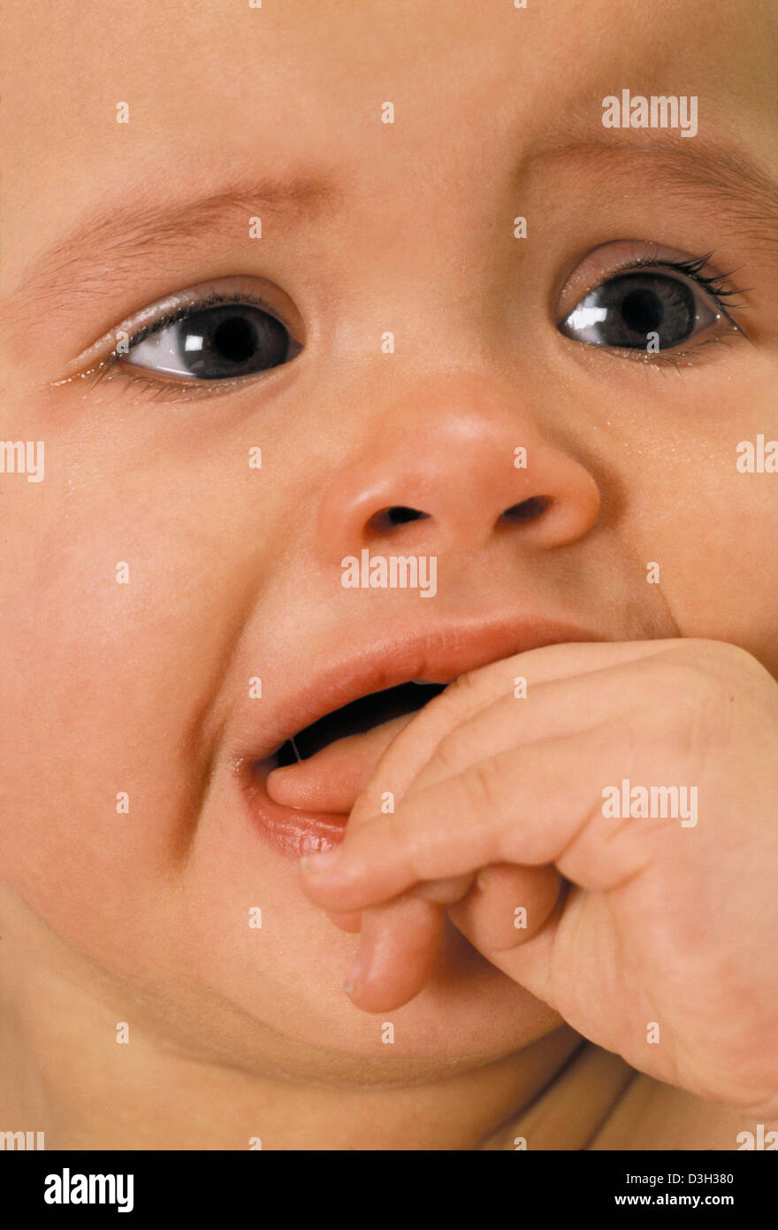 Baby crying alone hi-res stock photography and images - Alamy