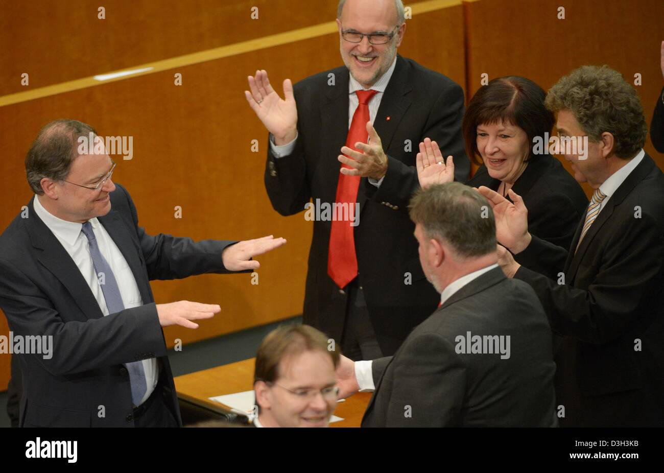 New Premier of Lower Saxony Stephan Weil (R) is applauded at the ...