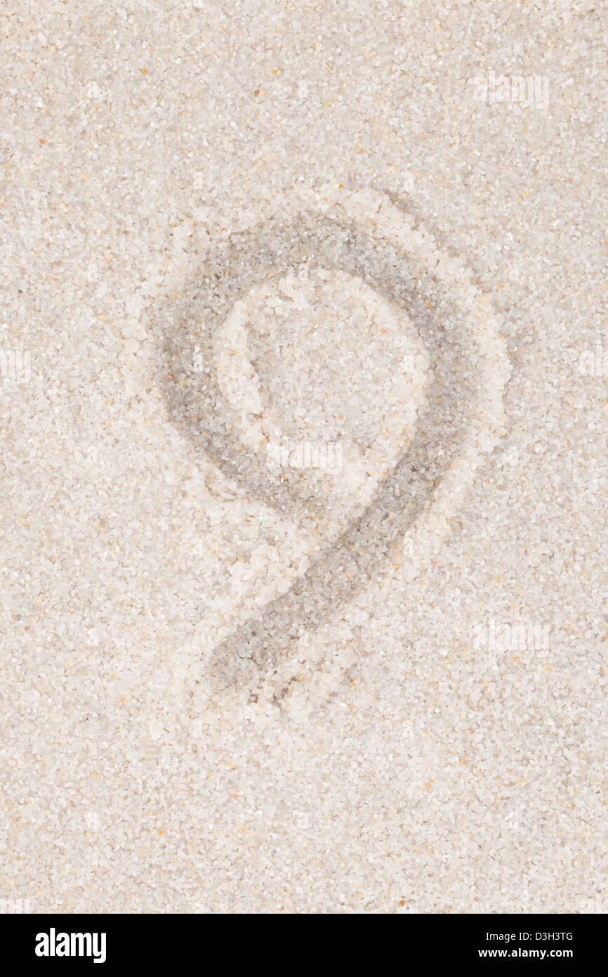 Digits on sand - clean background - 9 - Nine Stock Photo - Alamy