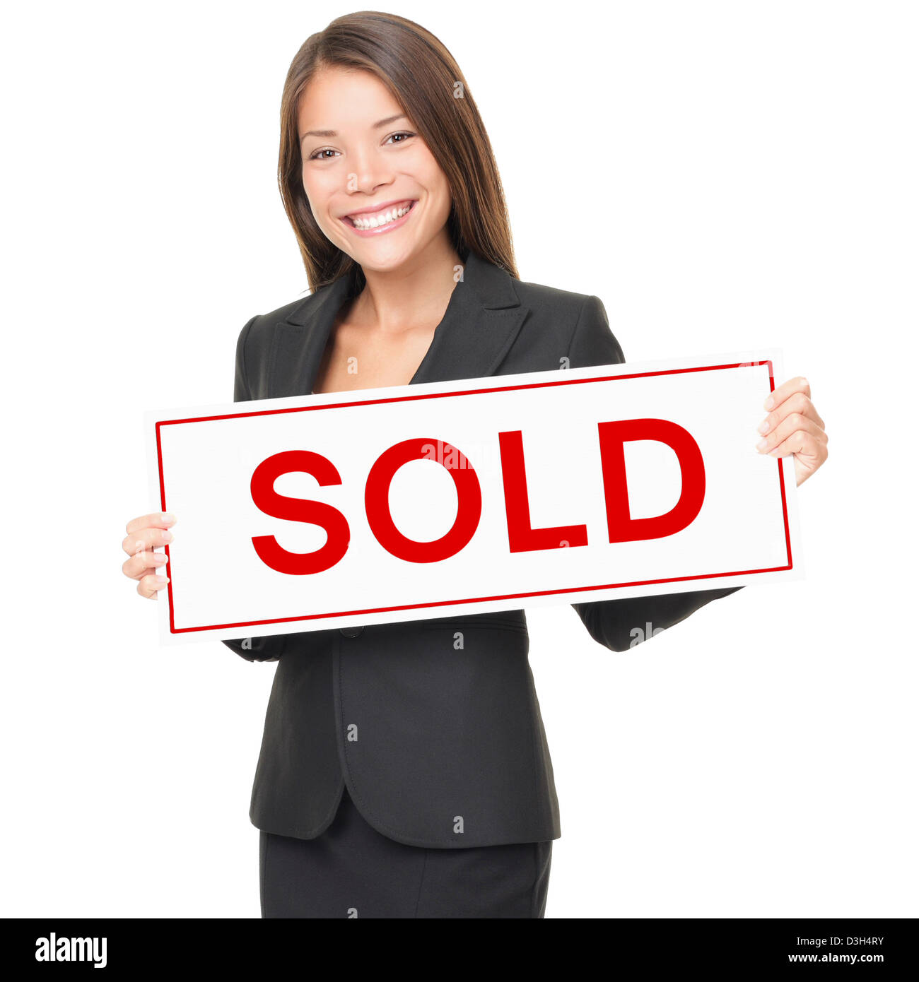 Portrait of beautiful cheerful Asian / Caucasian female realtor holding ...