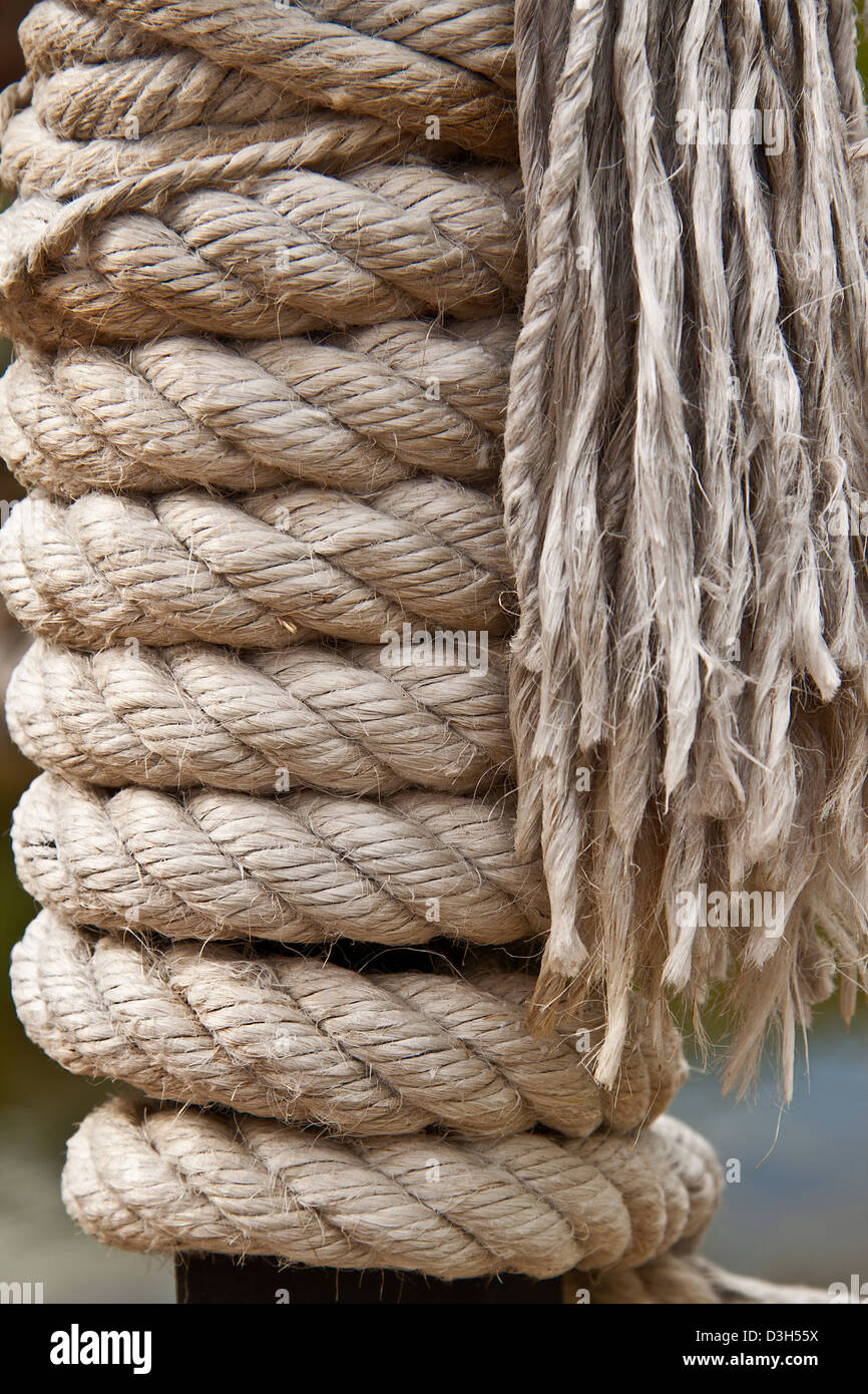 Rope tied to a piling Stock Photo - Alamy