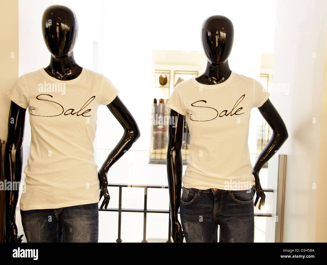 Two dummy sales in a fashion store Stock Photo - Alamy