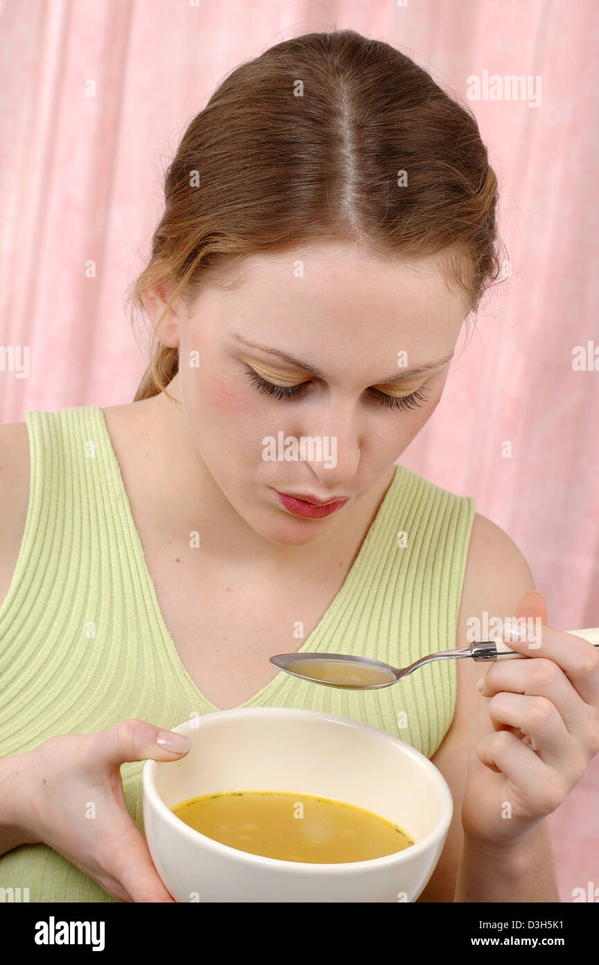 WOMAN EATING SOUP Stock Photo - Alamy