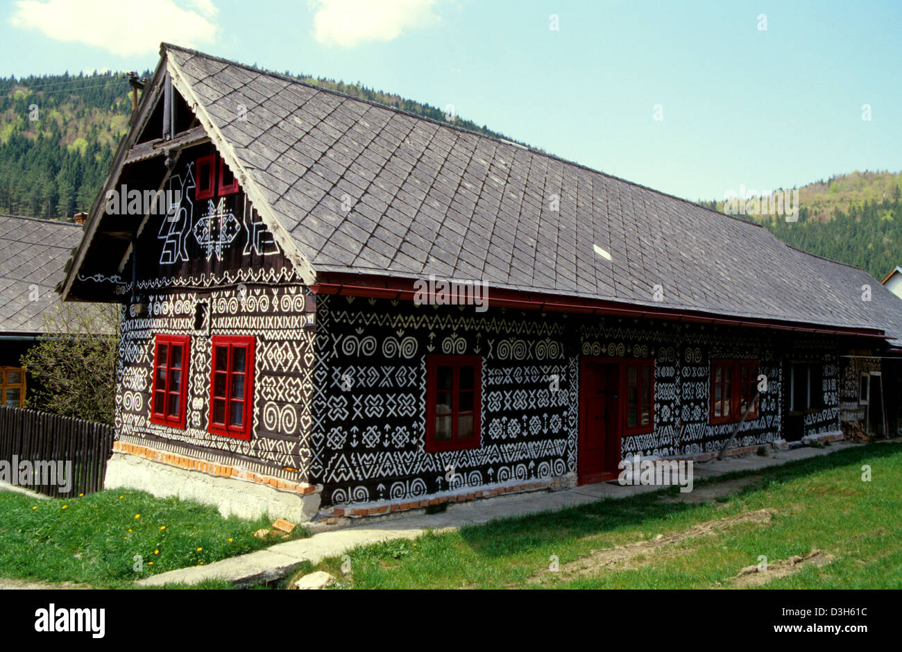 Traditionally decorated wooden cottage in Cicmany, Slovakia Stock Photo ...