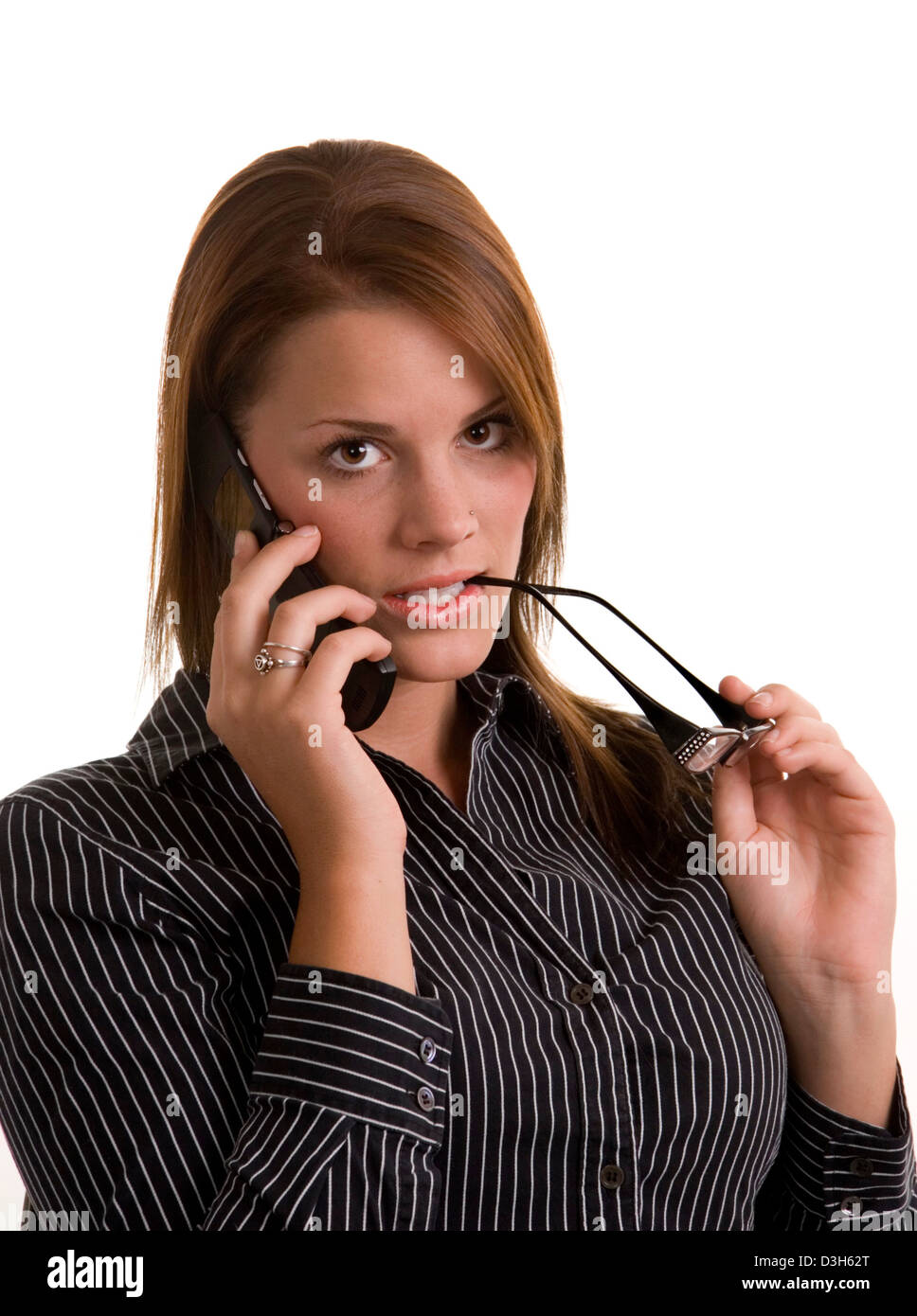 A young woman answering a personal call on her cell phone Stock Photo ...