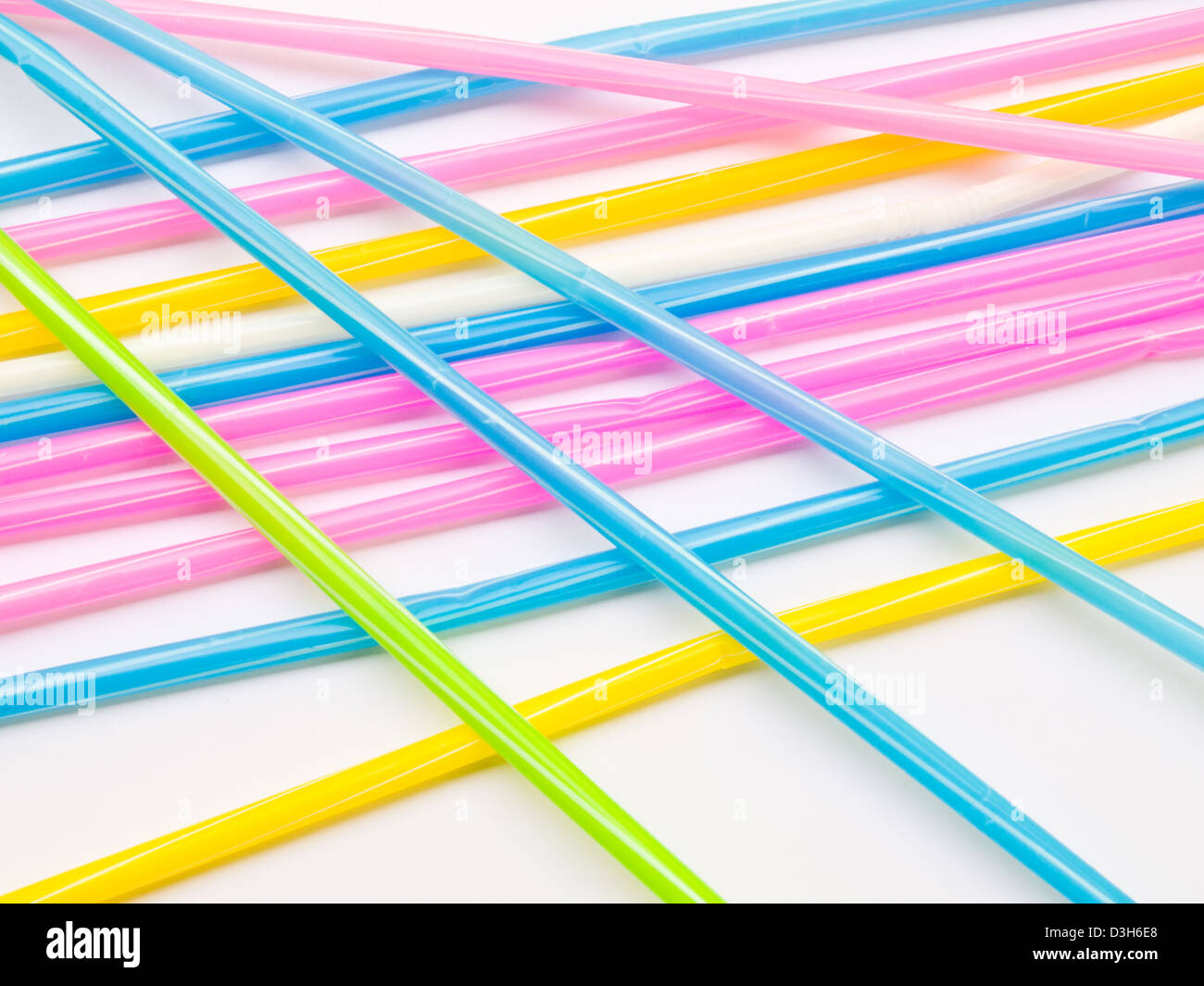 Colorful straws isolated on white background Stock Photo - Alamy