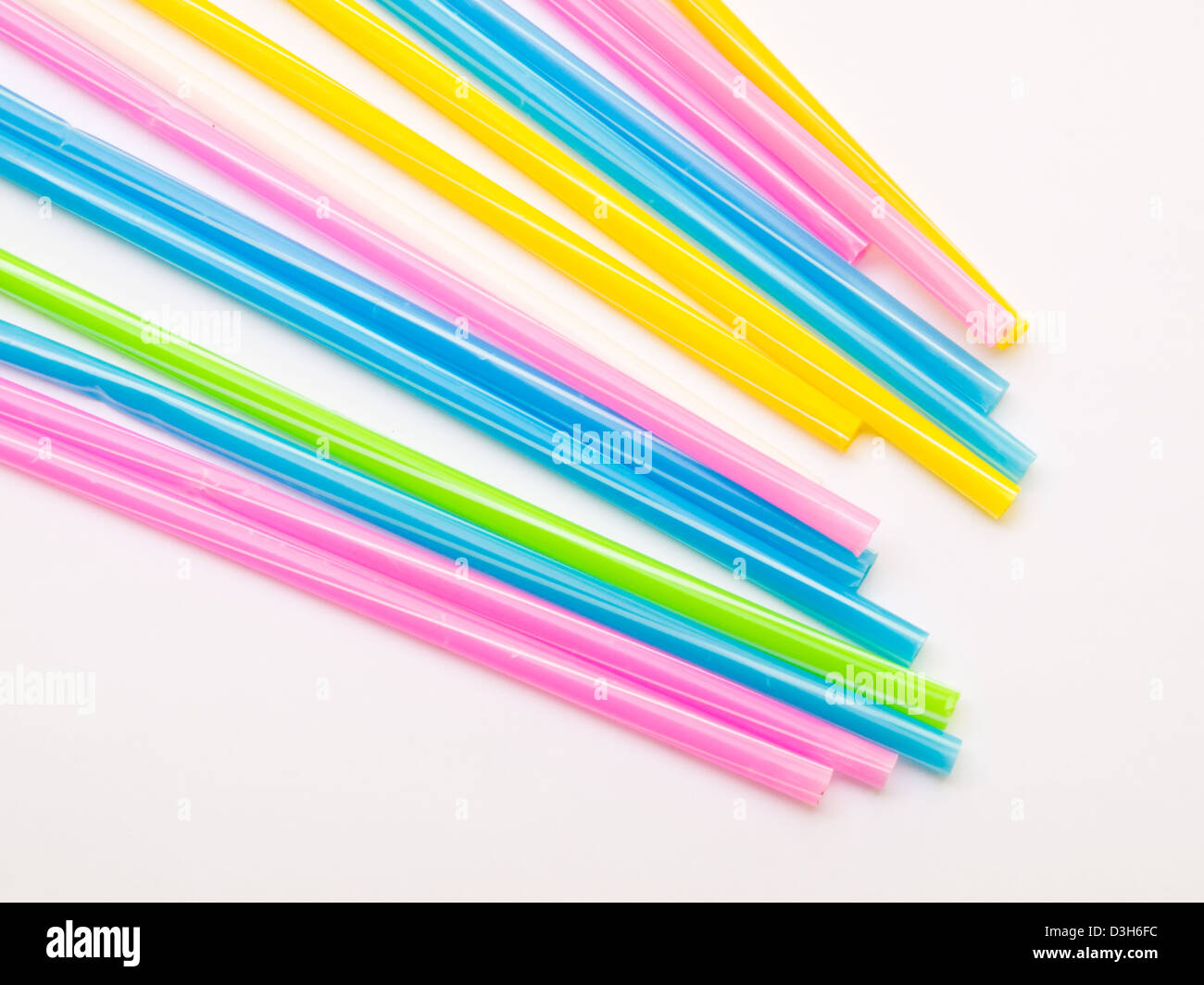 Colorful straws isolated on white background Stock Photo - Alamy