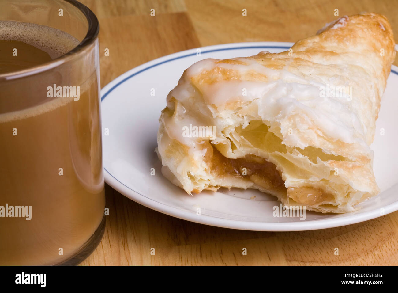 Coffee and an fresh apple turnover for breakfast Stock Photo - Alamy