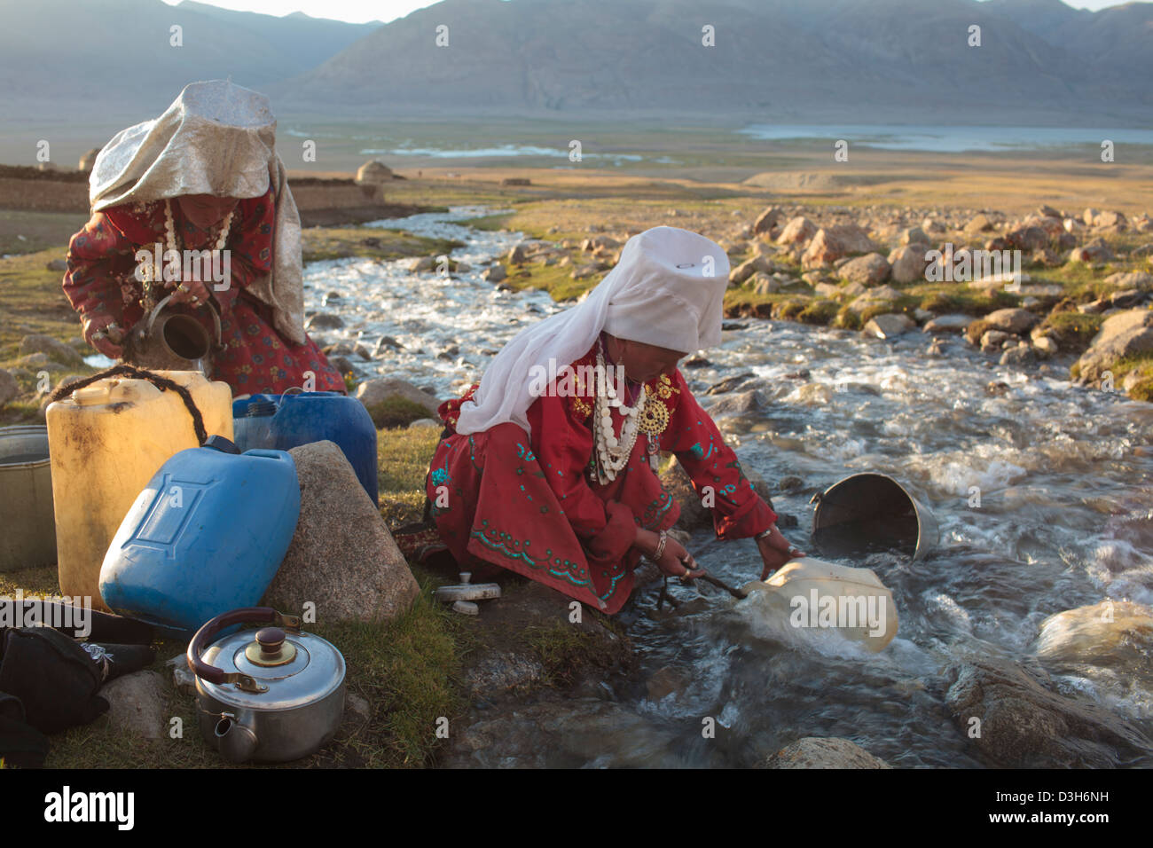 Women fetching water from a stream in the Wakhan Corridor, Badakhshan ...